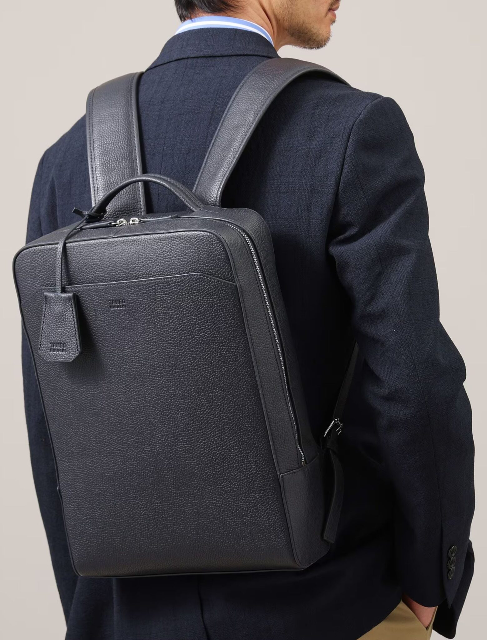NAVY VEGETABLE LEATHER BOX BACKPACK (G8701073) – TAKEO KIKUCHI Thailand